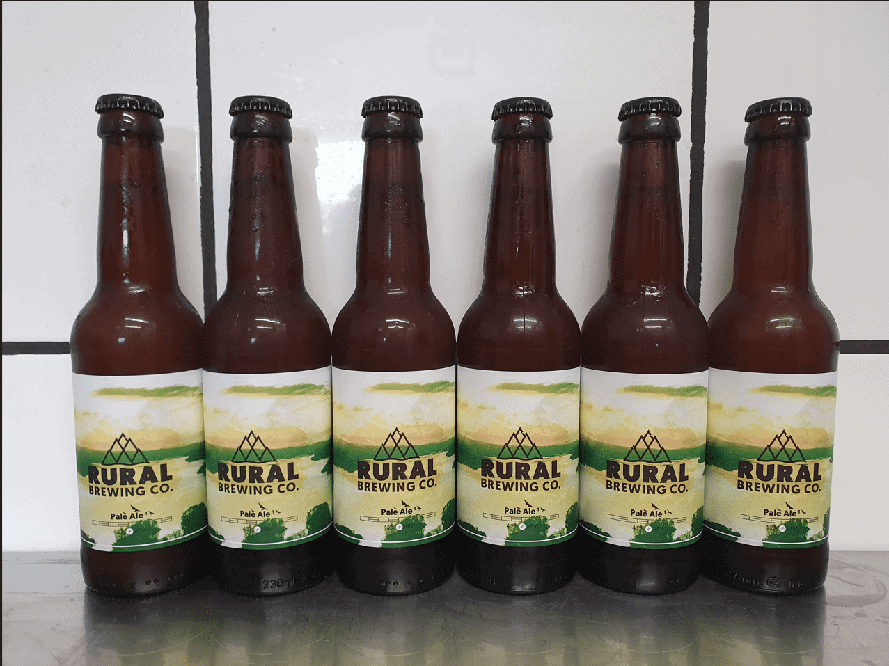 Labelling by Hand - Rural Brewing Co.